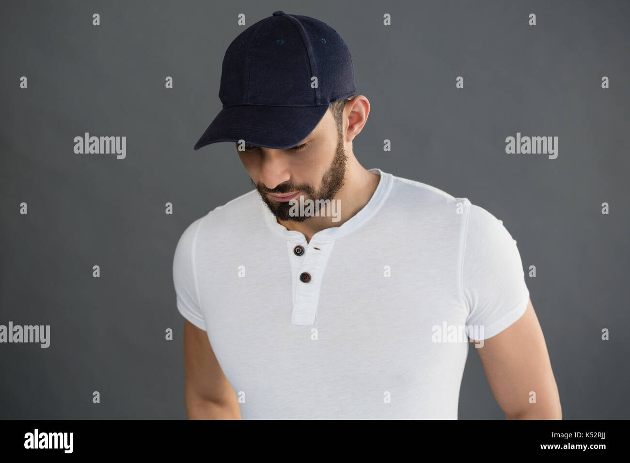 Posing with cap hi-res stock photography and images - Alamy