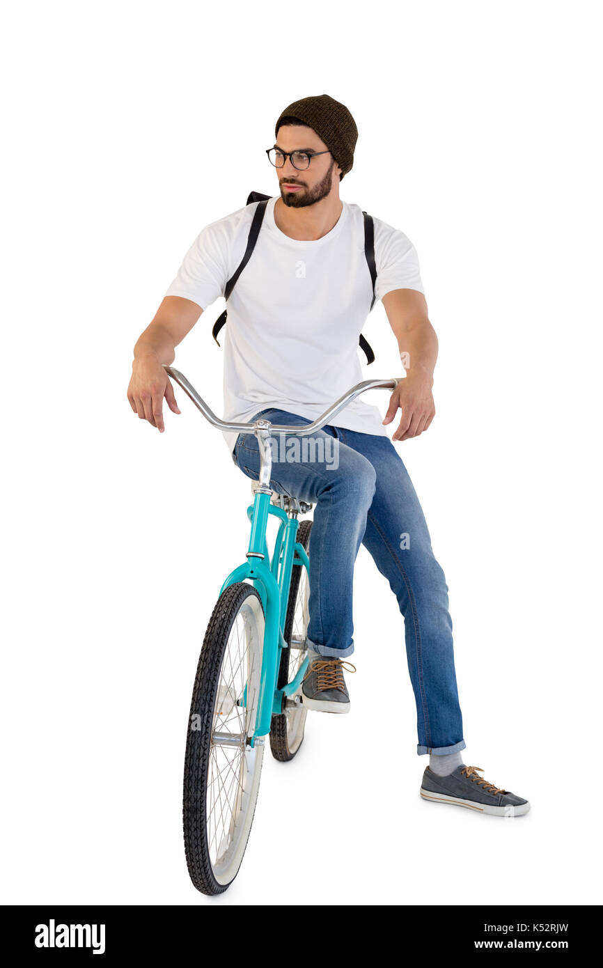 Handsome man posing with bicycle against white background Stock Photo ...