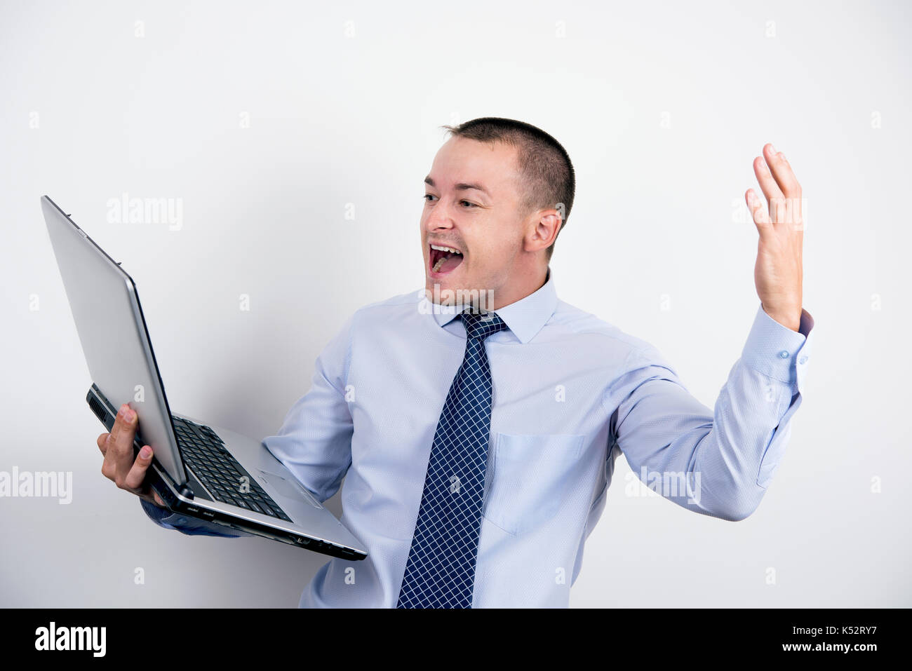 male with laptop happy Stock Photo - Alamy