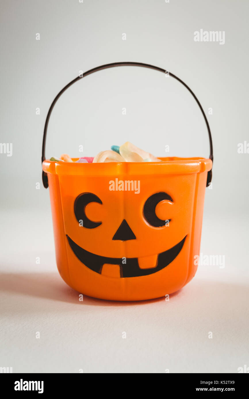 Close up of orange bucket over white background Stock Photo - Alamy