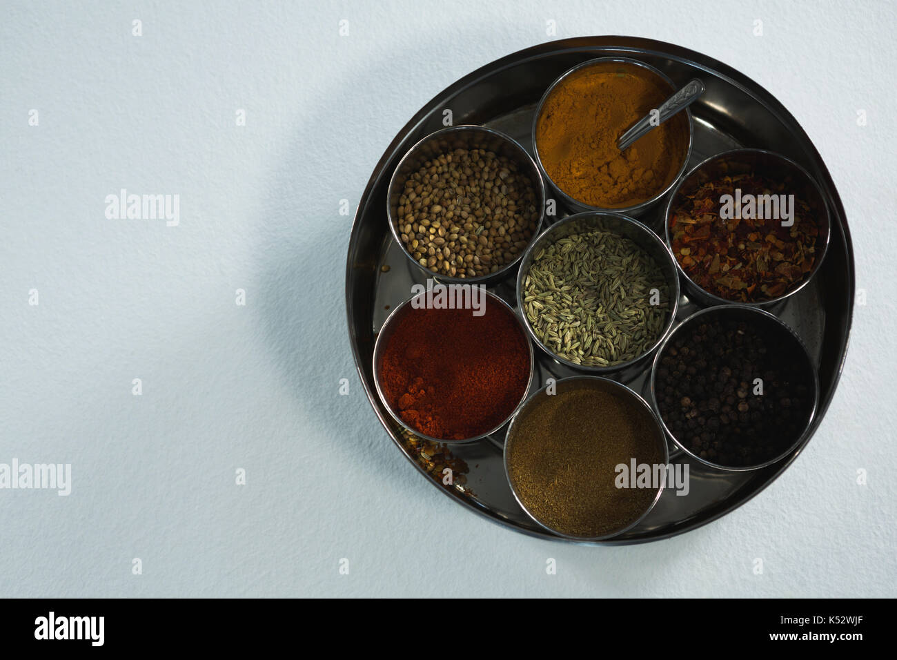 Overhead of typical spice box with multiple containers Stock Photo - Alamy