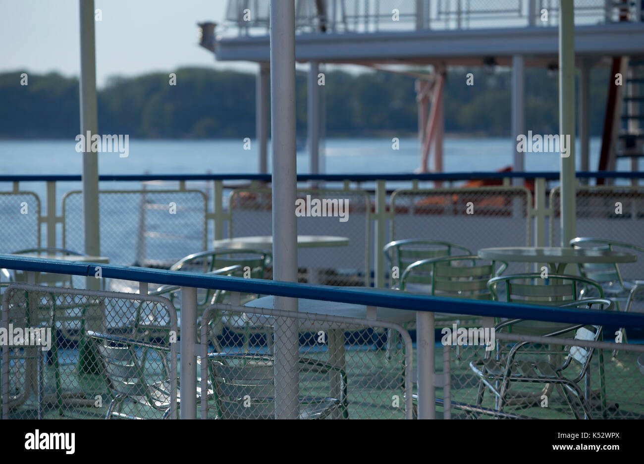 Chairs and tables on a river cruise ship deck Stock Photo - Alamy