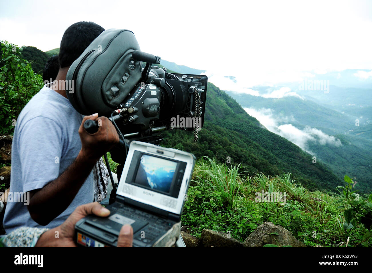 Cameraman at work, film shooting spot Stock Photo - Alamy