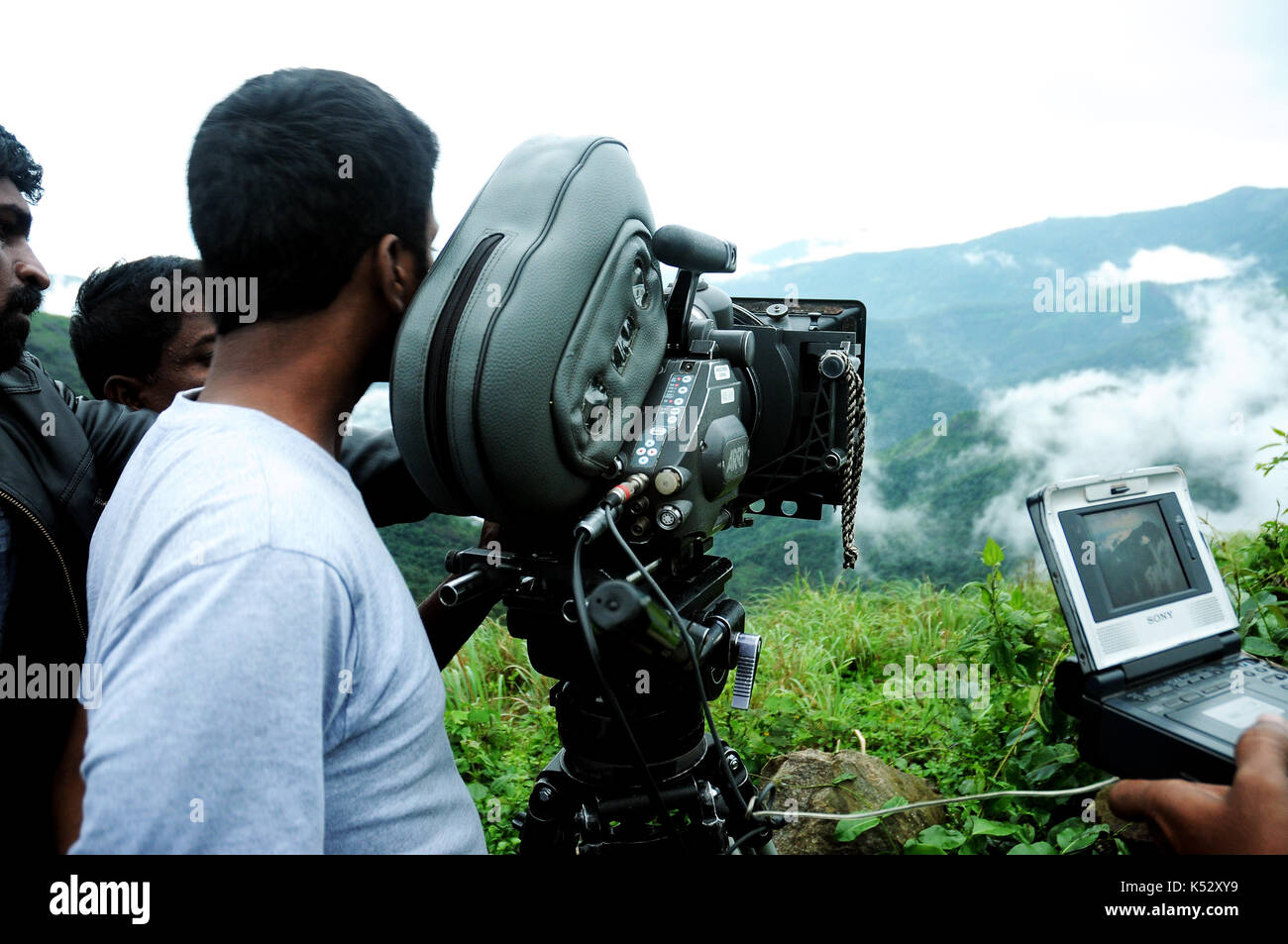 Cameraman at work, film shooting spot Stock Photo - Alamy
