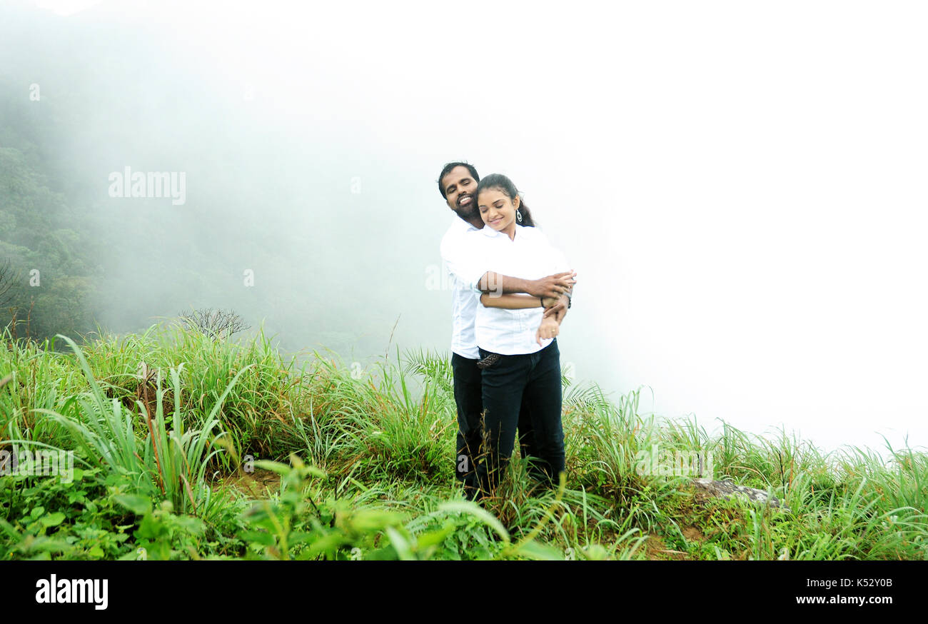 Hugging couple in high mountains, couple hugging in beautiful mountains ...