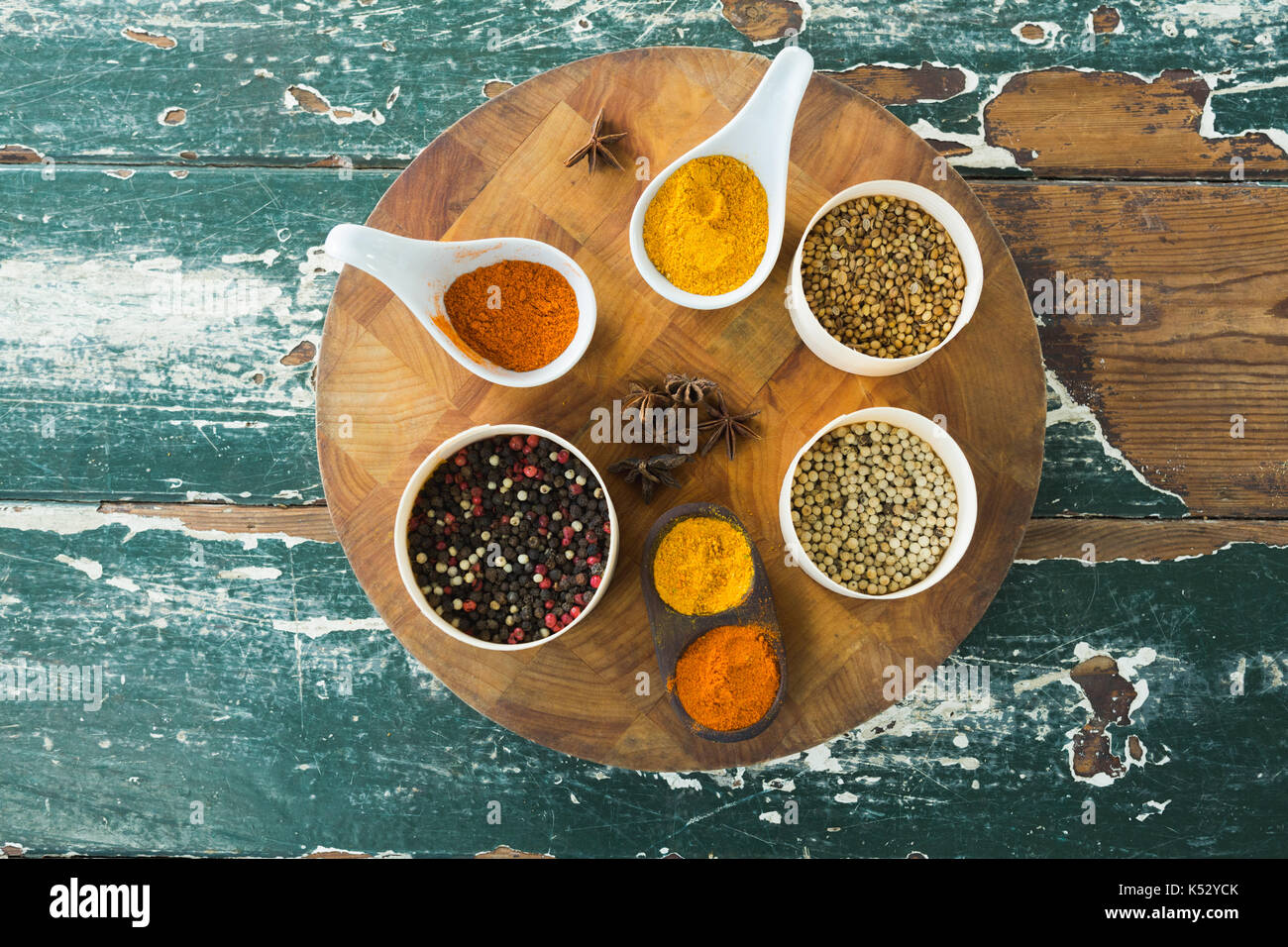 Overhead of various spices on board Stock Photo - Alamy