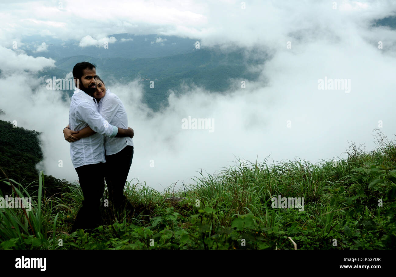Hugging couple in high mountains, couple hugging in beautiful mountains ...
