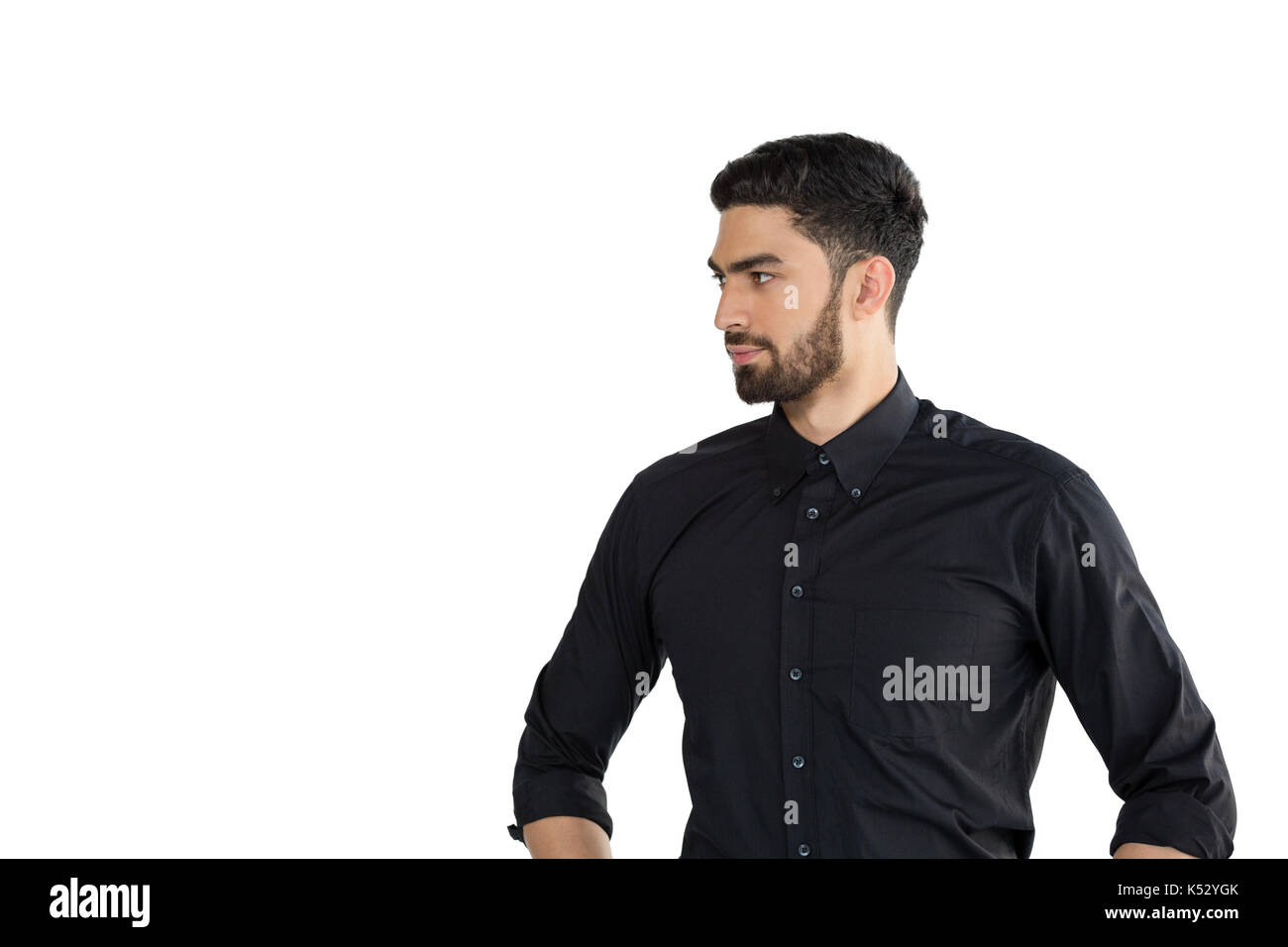 Handsome man posing against white background Stock Photo - Alamy
