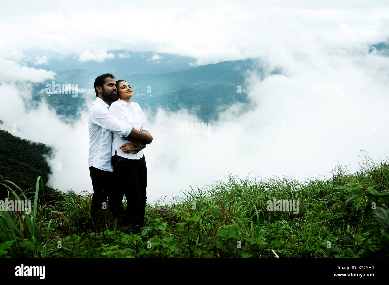 Hugging couple in high mountains, couple hugging in beautiful mountains ...