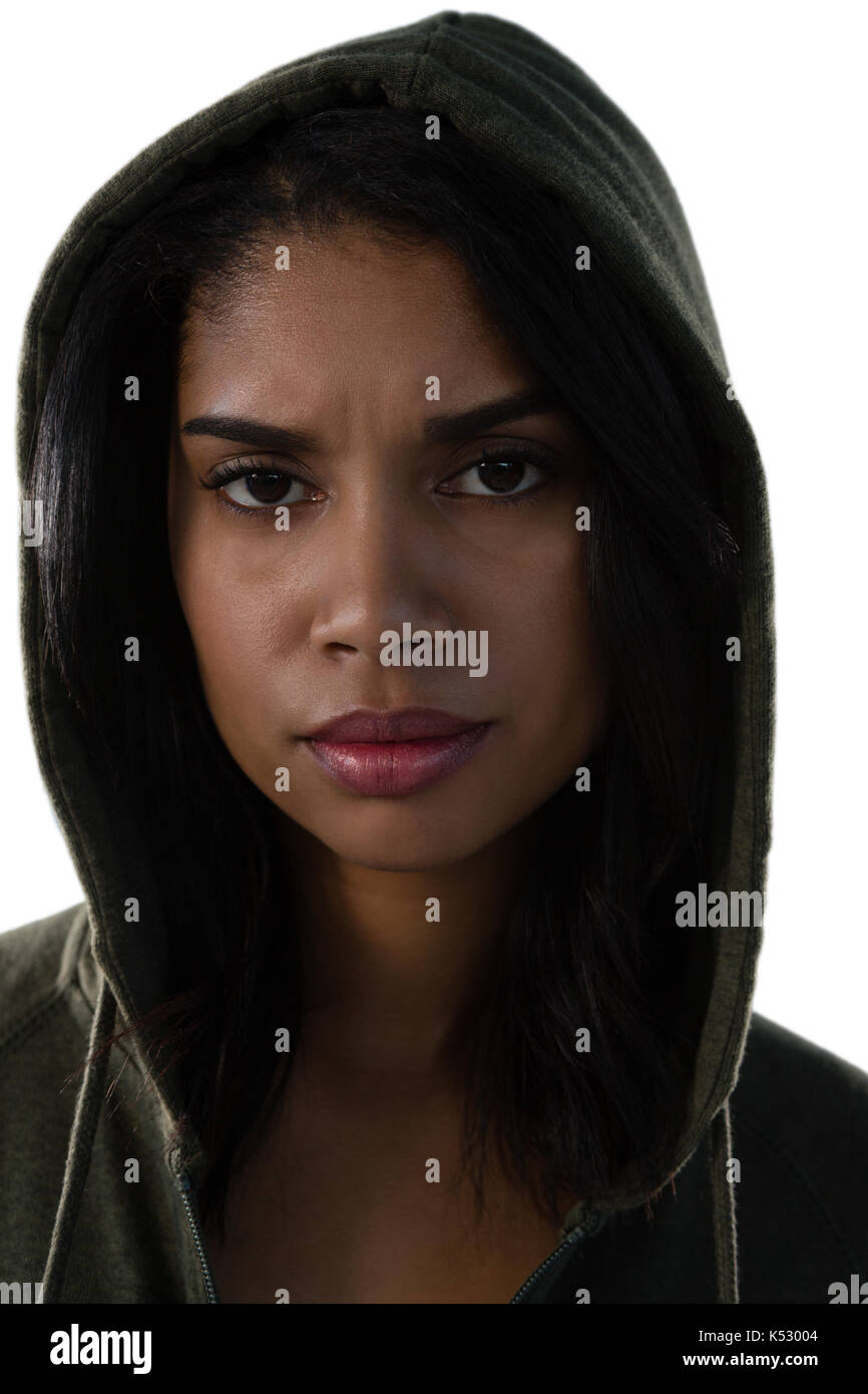 Close up portrait of determined female athlete against white background ...