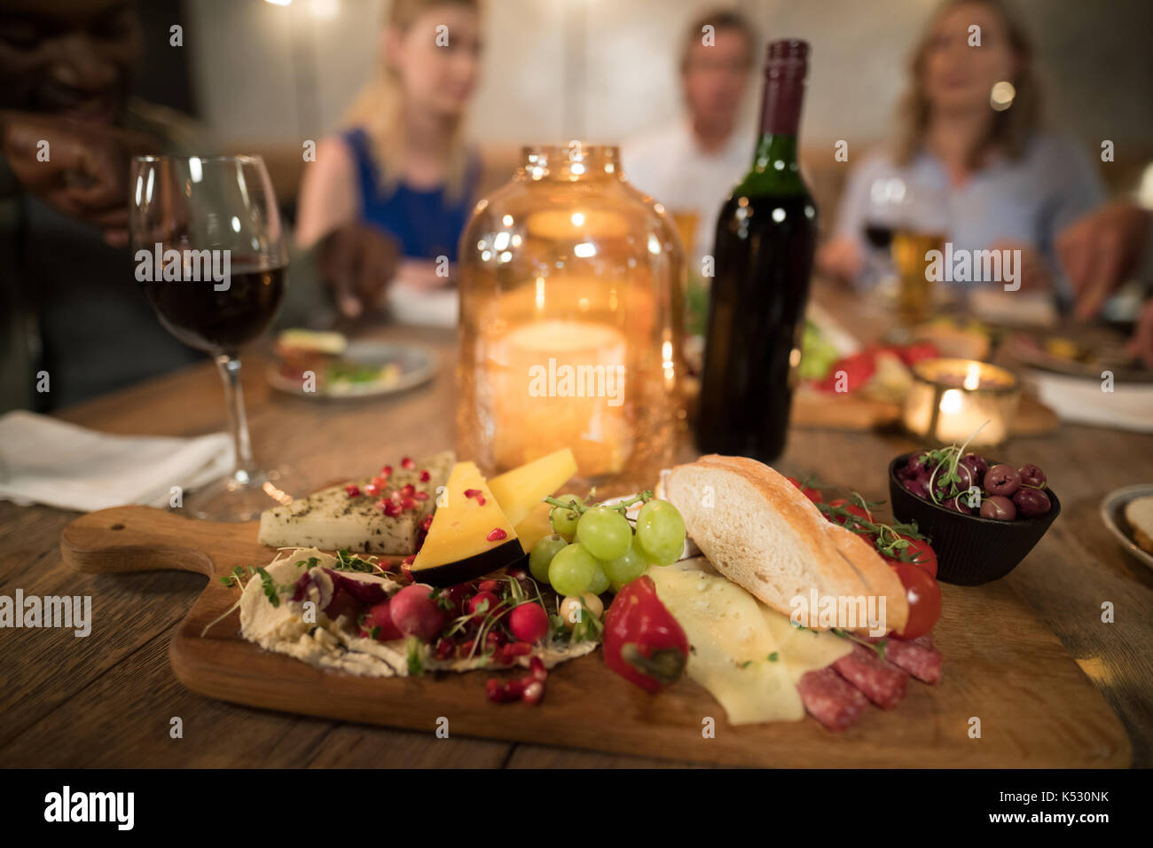 Various food and drink on dining table in restaurant Stock Photo - Alamy