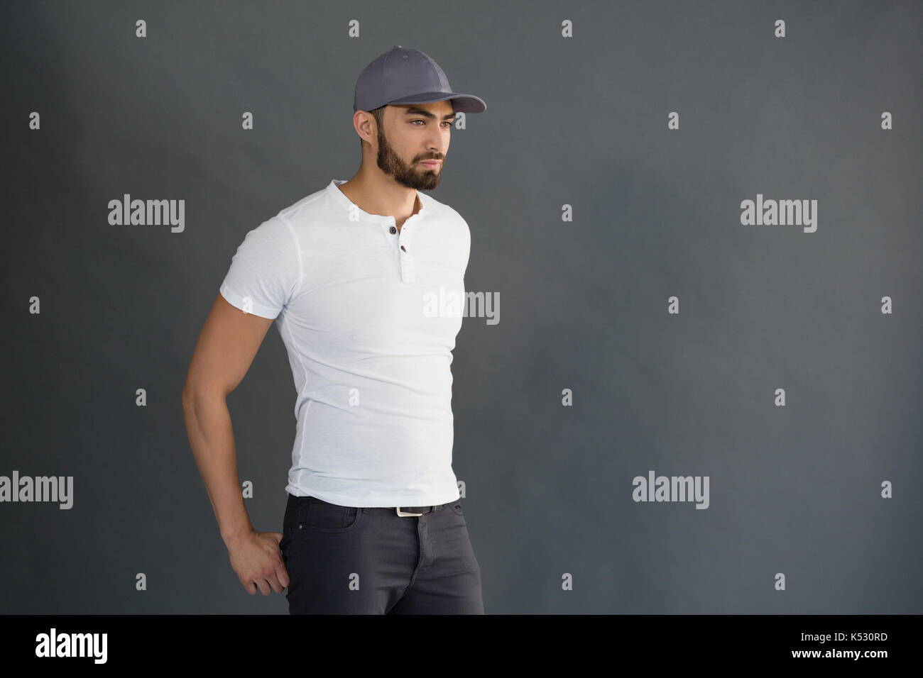 Posing with cap hi-res stock photography and images - Alamy