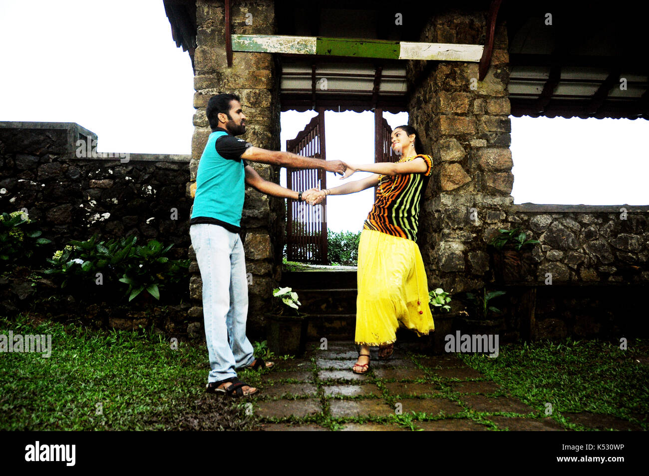 Young couple having fun at outdoors, actor acting at shooting movie ...