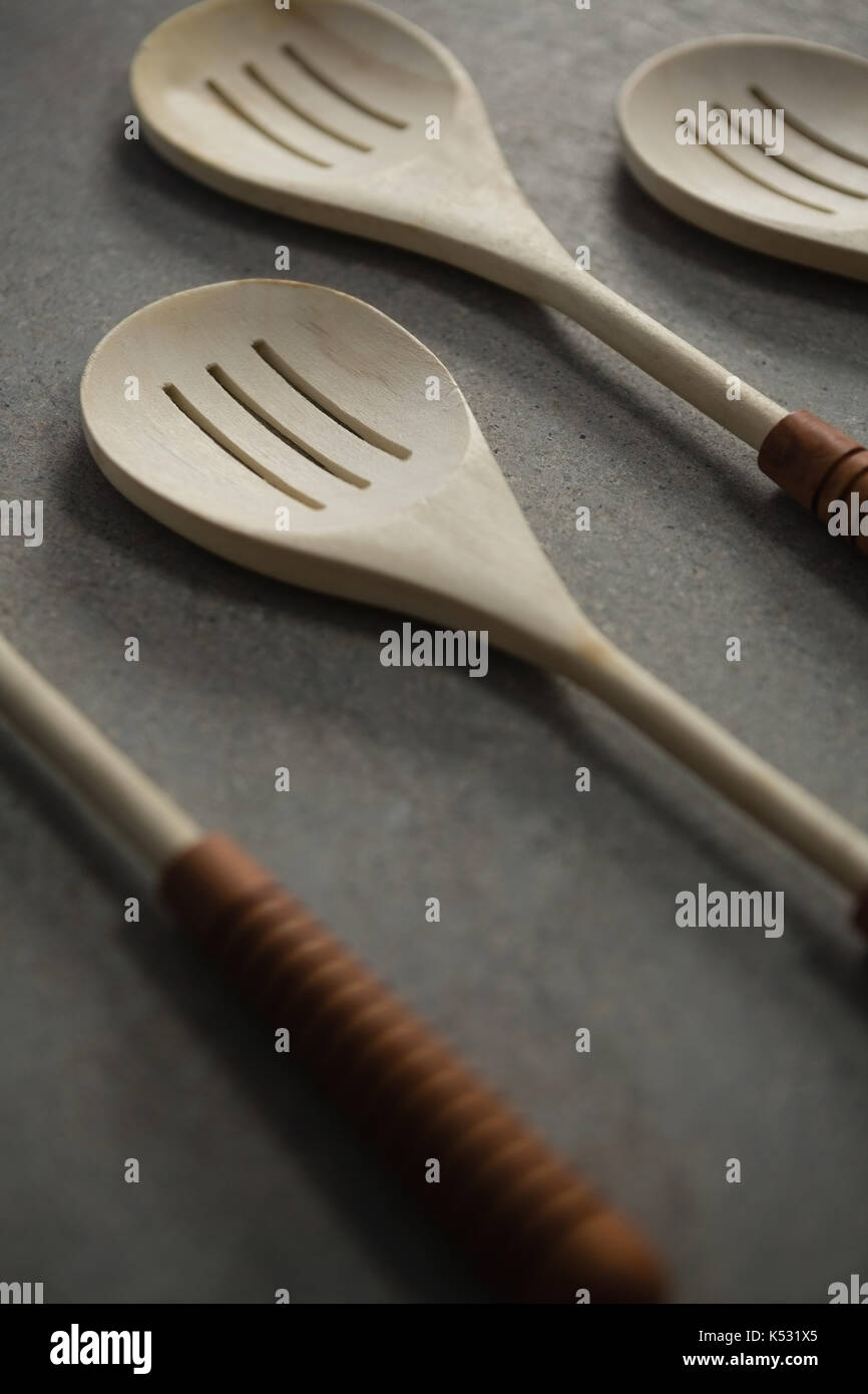Spatulas arranged side by side on table Stock Photo - Alamy