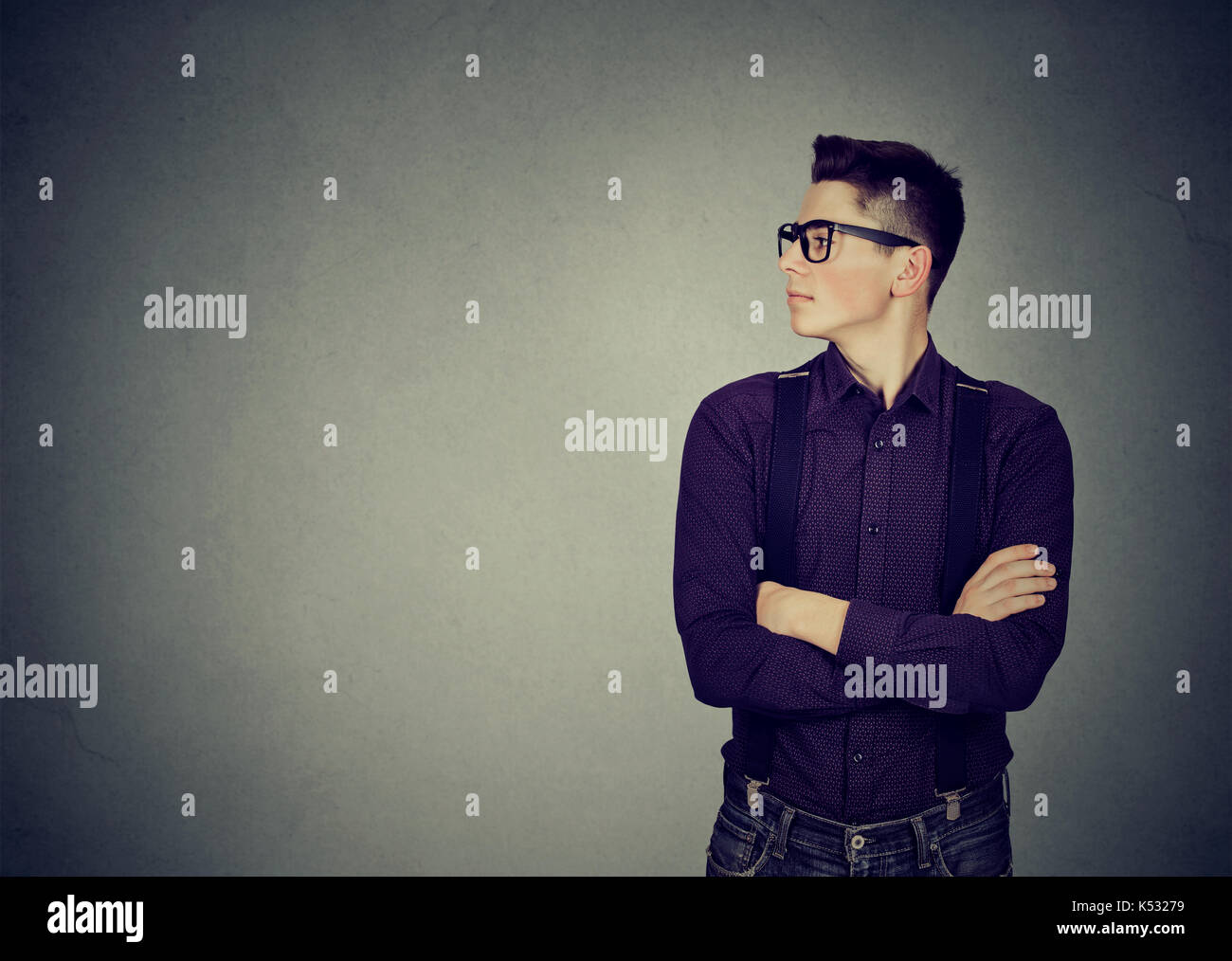 Side profile young man looking at his side Stock Photo - Alamy