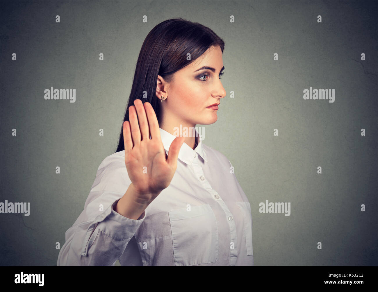 Closeup portrait angry woman giving talk to hand gesture with palm ...