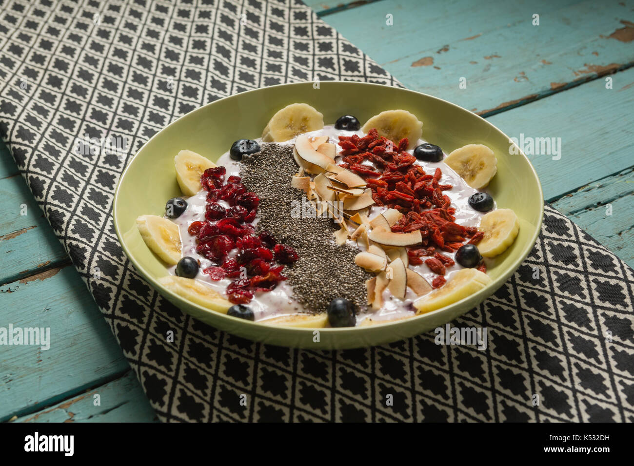 Close-up of fruit cereal in plate on a napkin cloth Stock Photo - Alamy