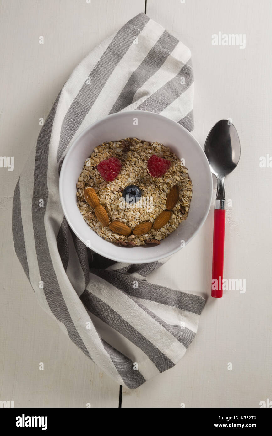 Overhead of breakfast cereals forming a smiley face Stock Photo - Alamy