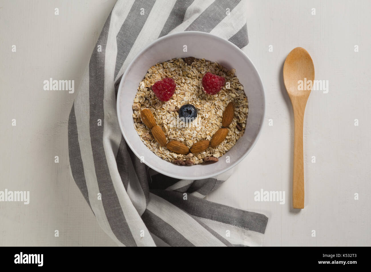 Overhead of breakfast cereals forming a smiley face Stock Photo - Alamy