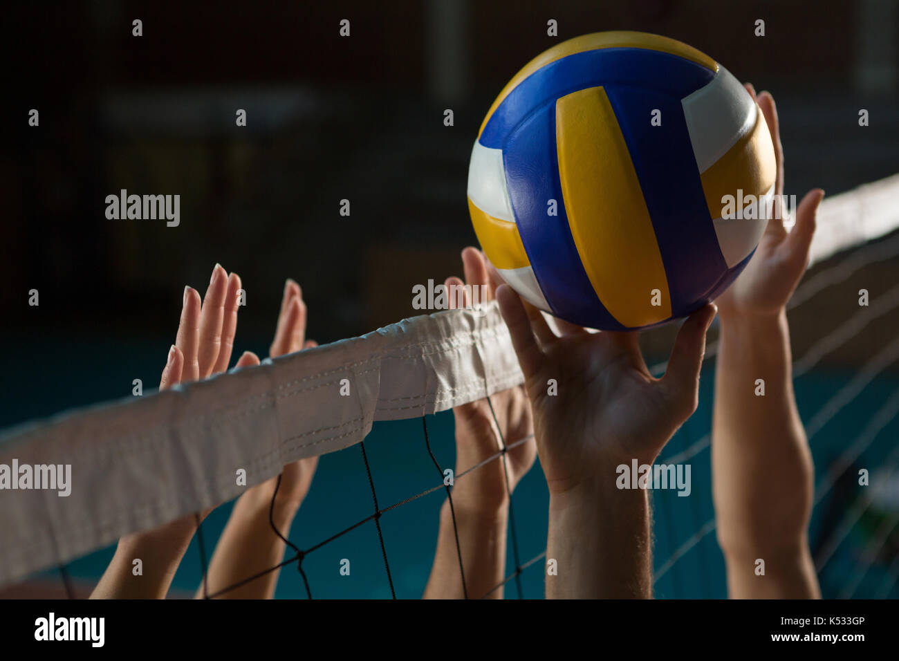 Volleyball ball and net hands indoor hi-res stock photography and ...