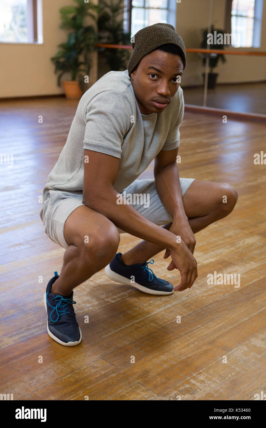 Crouching dance hi-res stock photography and images - Alamy