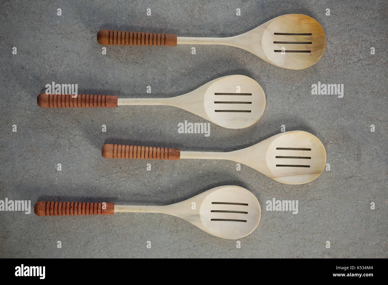 Overhead view of spatula arranged side by side on tables Stock Photo ...