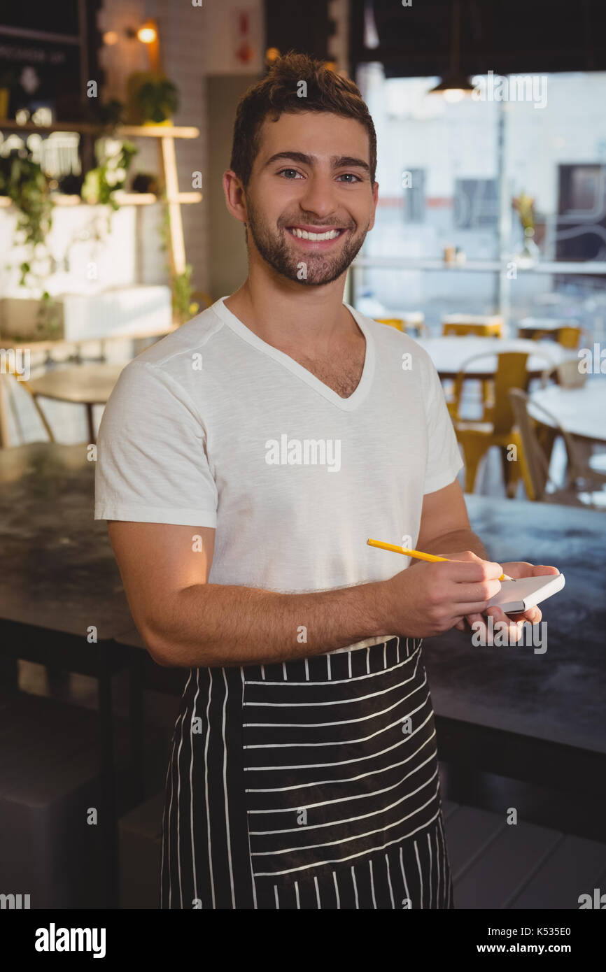 Taking order at counter hi-res stock photography and images - Alamy