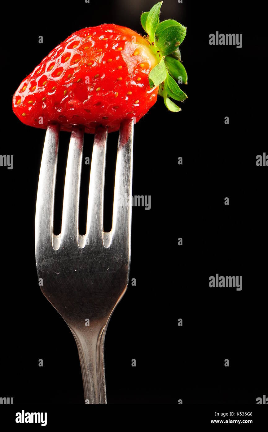 Fork strawberry hi-res stock photography and images - Alamy