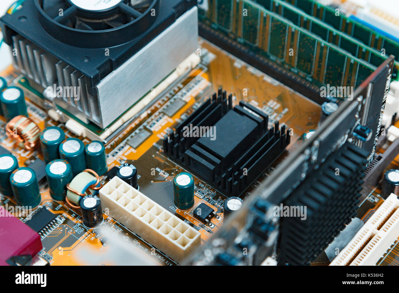 Circuit board on technical background Stock Photo - Alamy