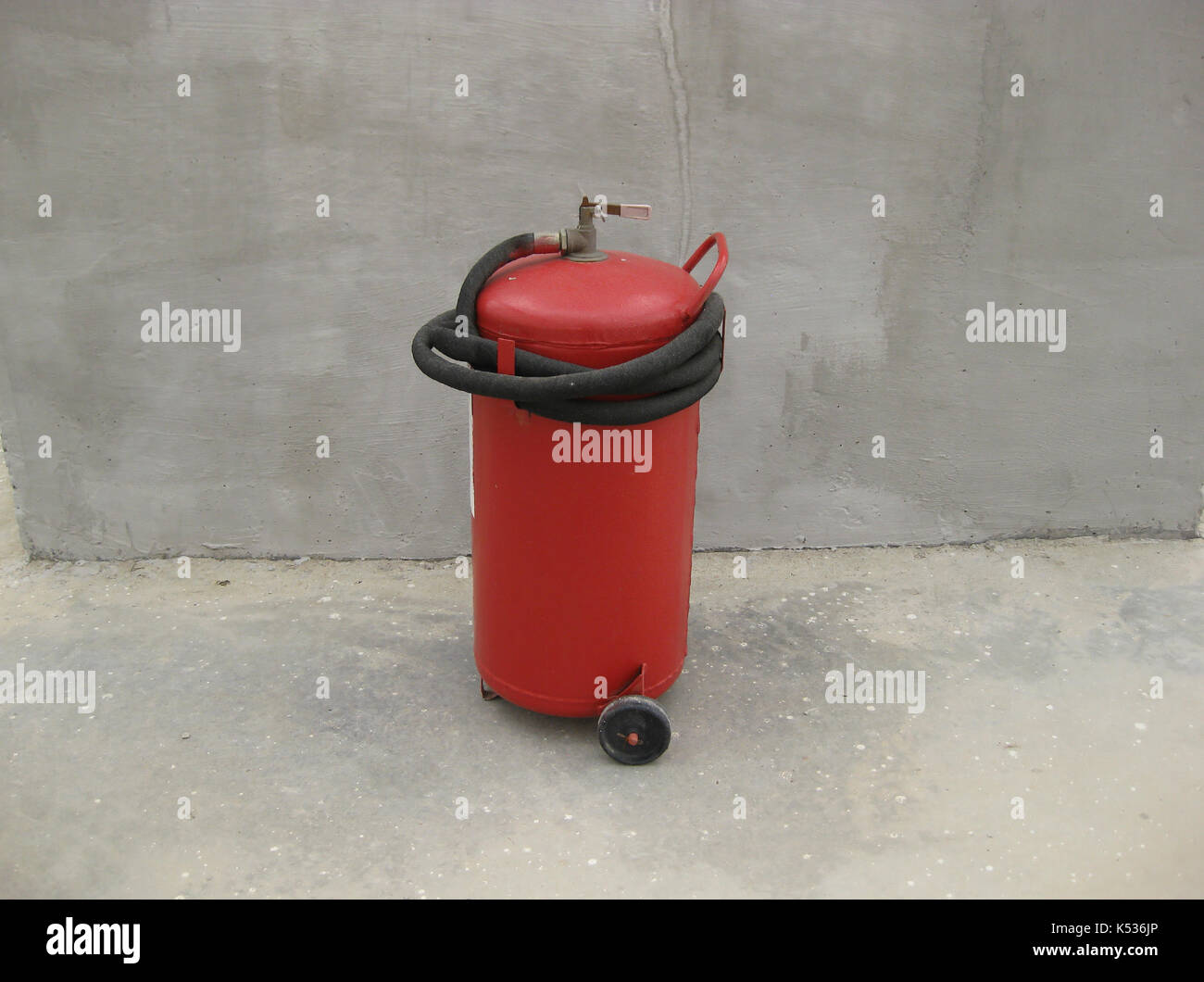 Fire extinguisher. Equipment for primary oil refining Stock Photo - Alamy