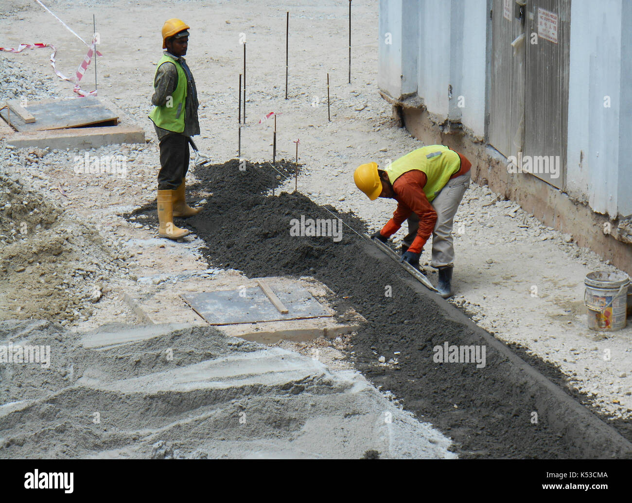 SEREMBAN, MALAYSIA -MAY 16, 2017: Construction workers fabricating ...