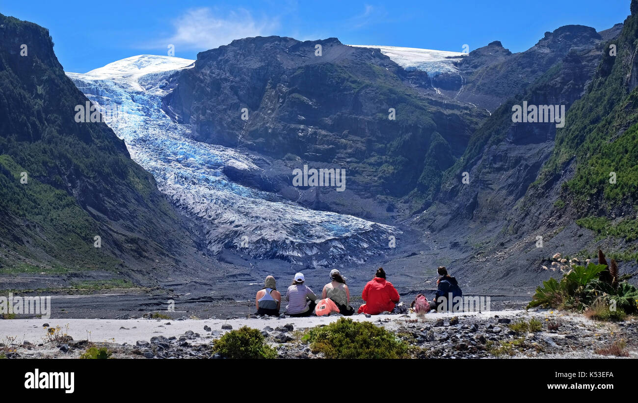 Pumalin national park. Chile. Women watching a view of the glacier on a ...