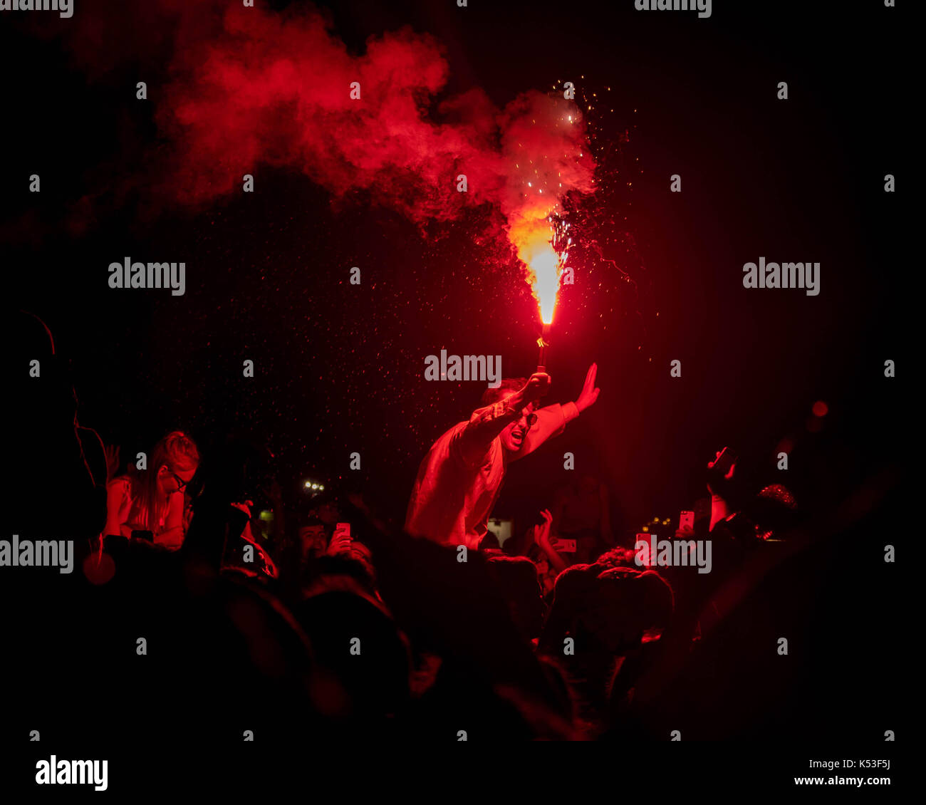 Red smoke flare hi-res stock photography and images - Alamy