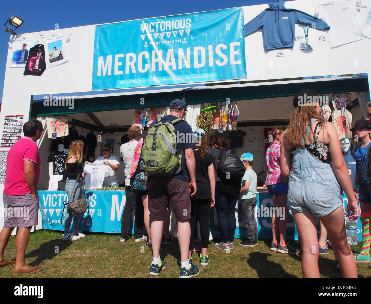 The merchandise stall at an outdoor music festival Stock Photo - Alamy