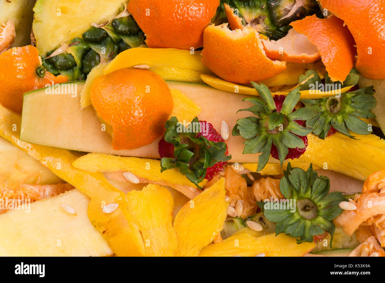 Close up of colorful fresh fruit salad waste background good for ...