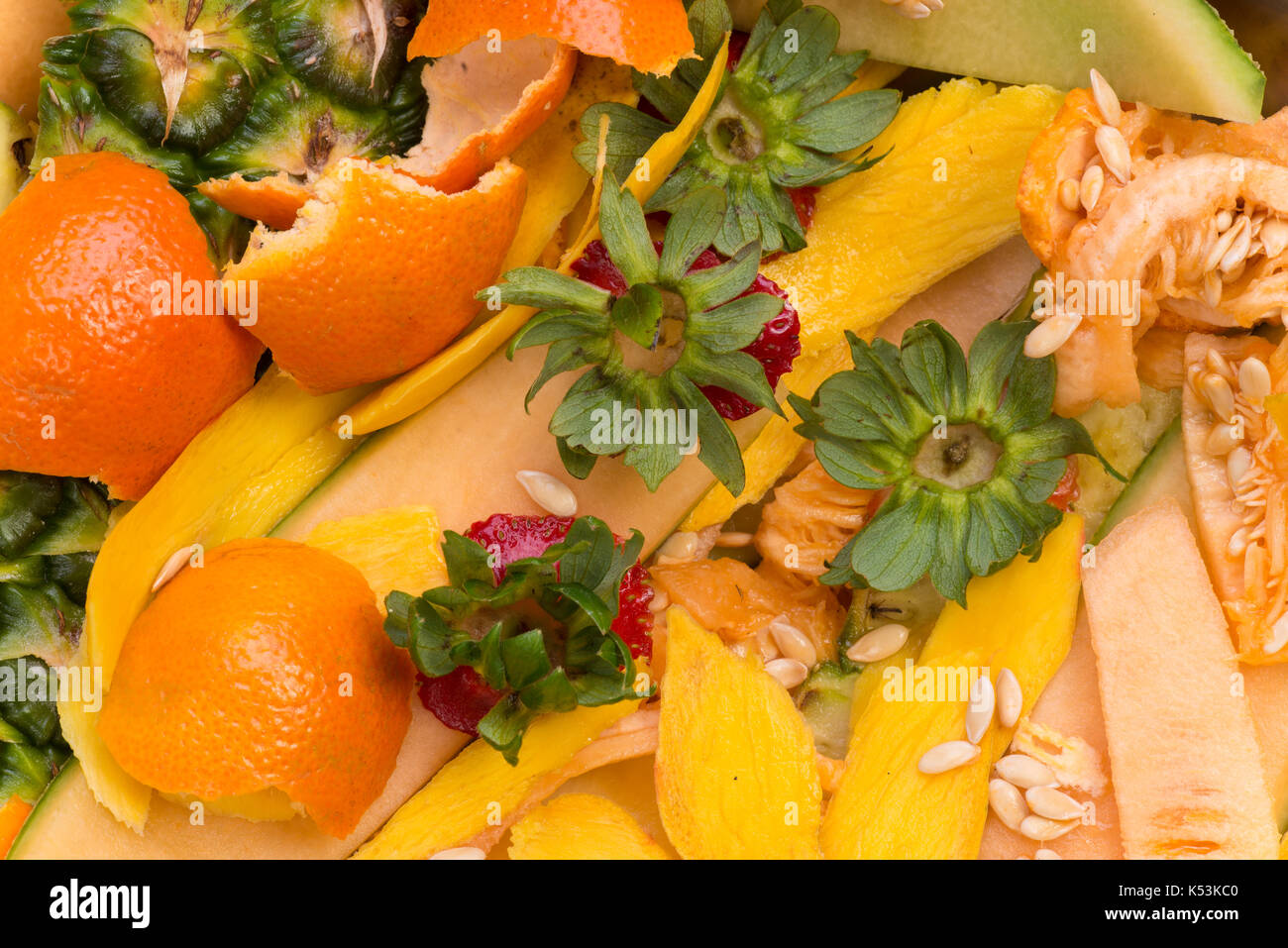 Close up of colorful fresh fruit salad waste background good for ...