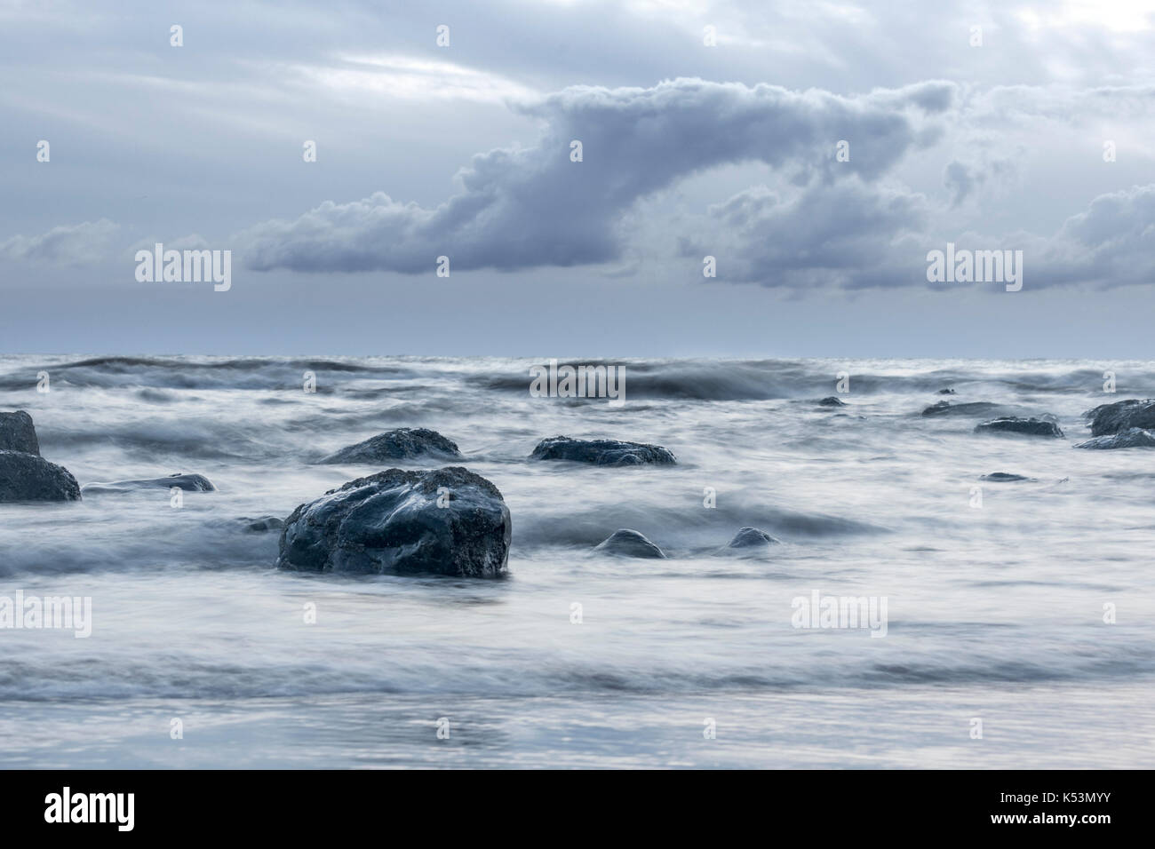 Beautiful seascape background, rocks in the Irish Sea at Seascale beach ...