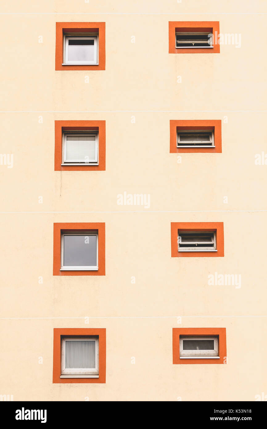 vertical alignment of square windows in an old residential building ...