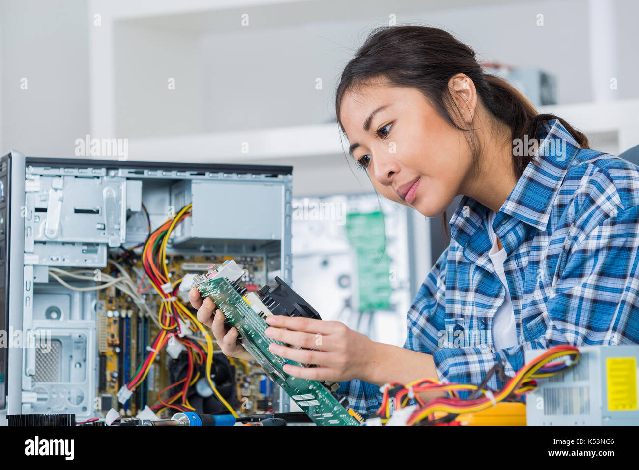 woman pc specialist fixing broken computer indoors Stock Photo - Alamy