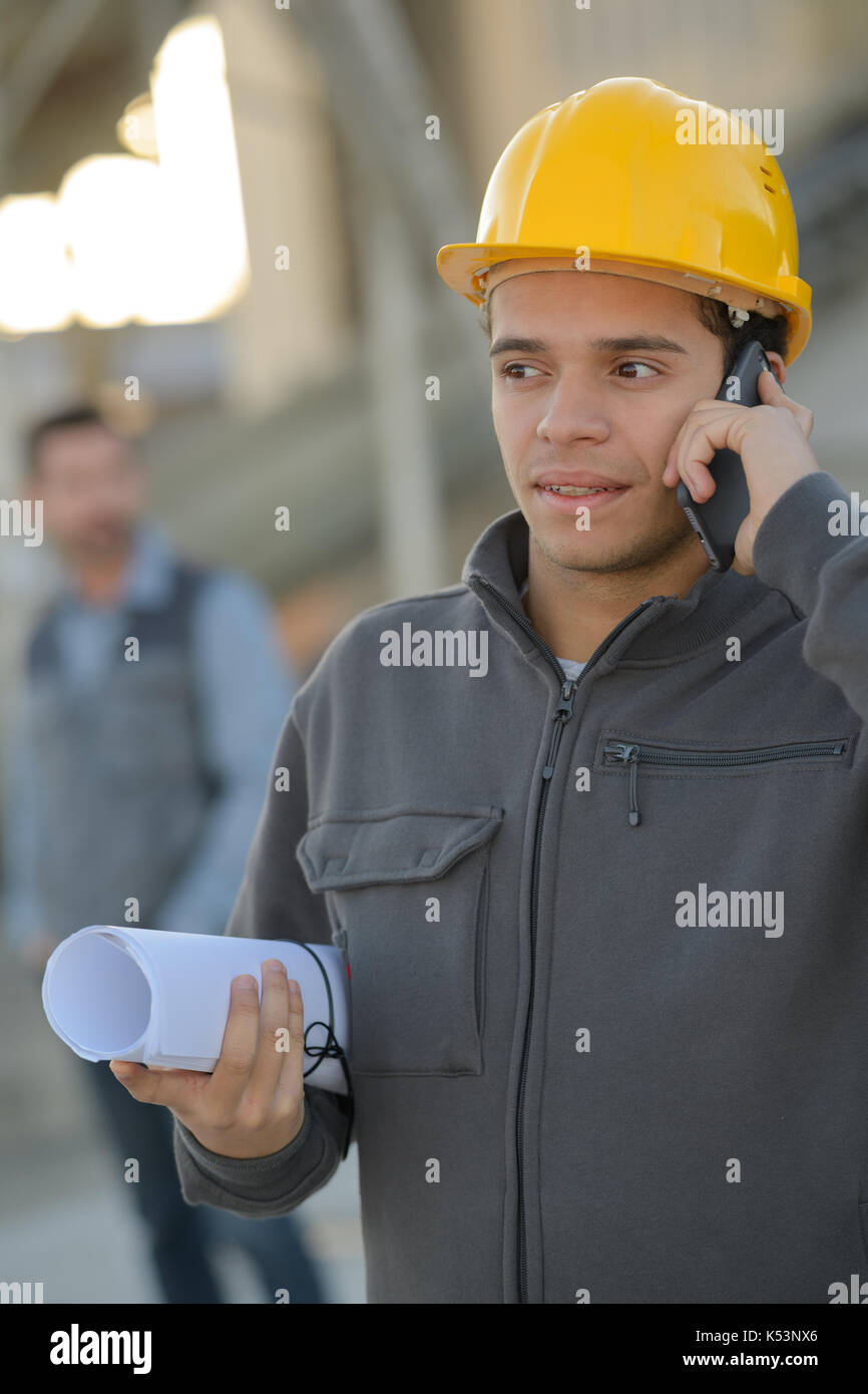 the young engineer on call Stock Photo - Alamy