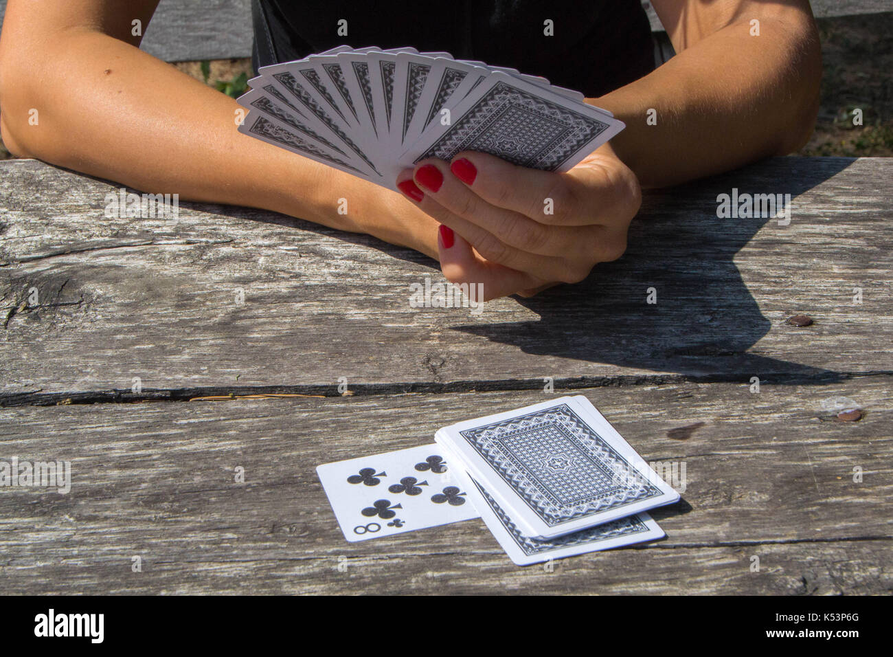 Hand holding cards hi-res stock photography and images - Alamy
