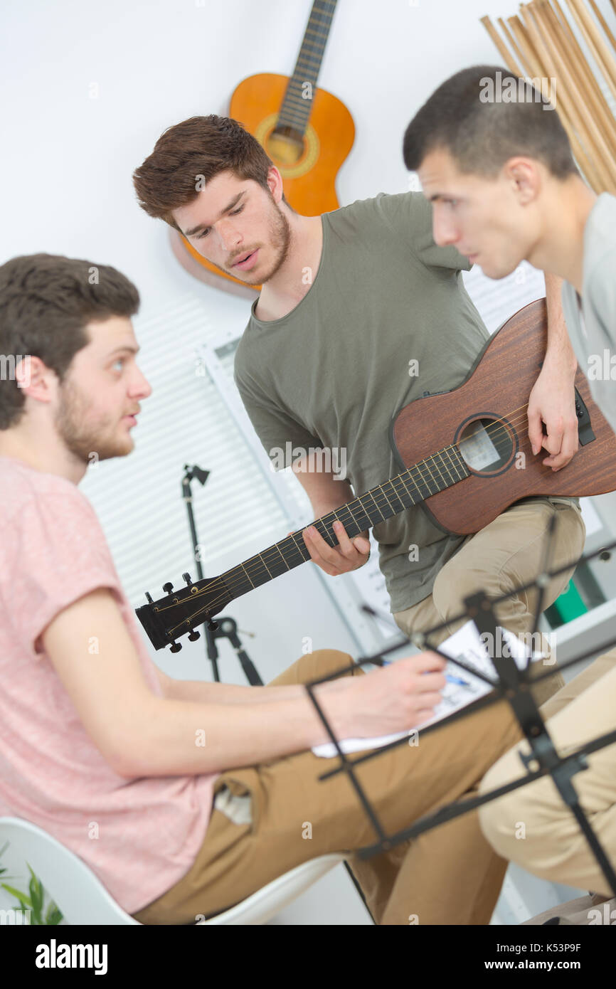 three friends making music at home Stock Photo - Alamy