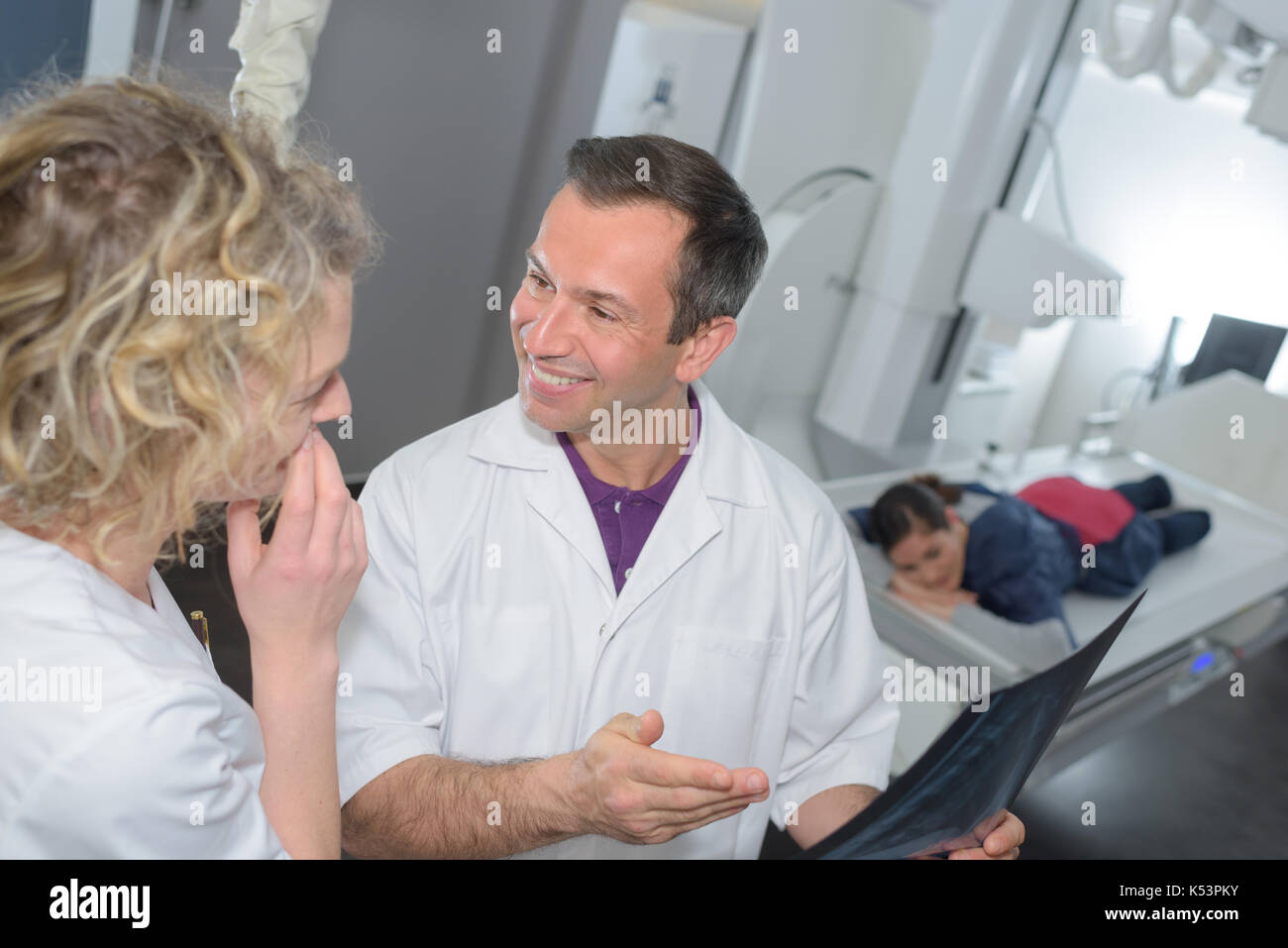 doctor and nurse laughing Stock Photo - Alamy