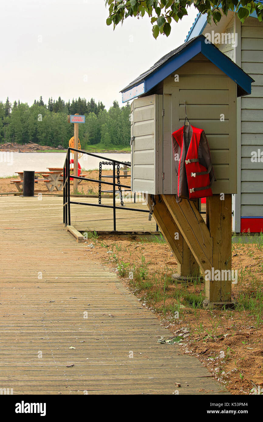 A life jacket loaner station at a public beach Stock Photo - Alamy