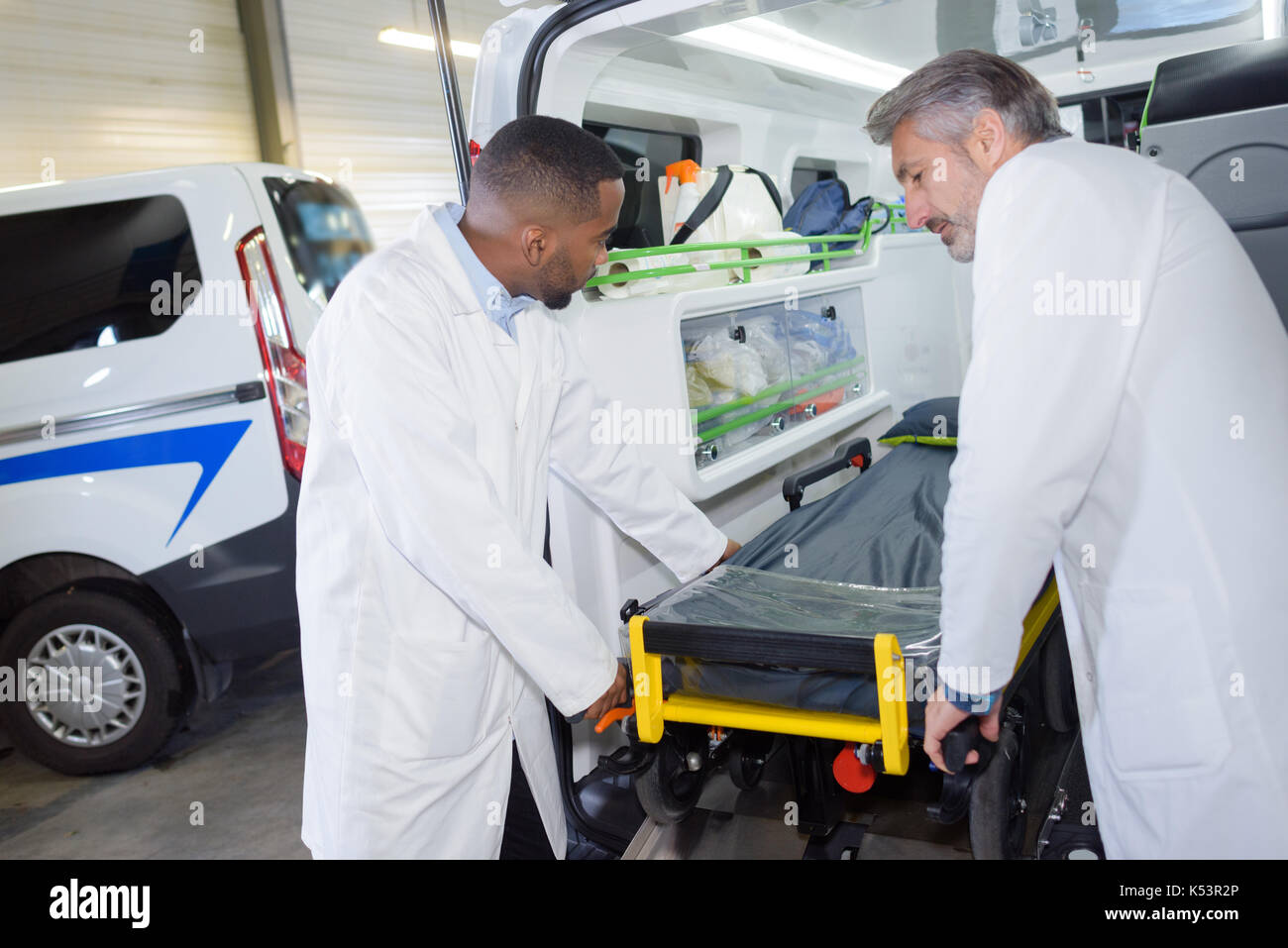 rescue team preparing for action in hangar Stock Photo - Alamy