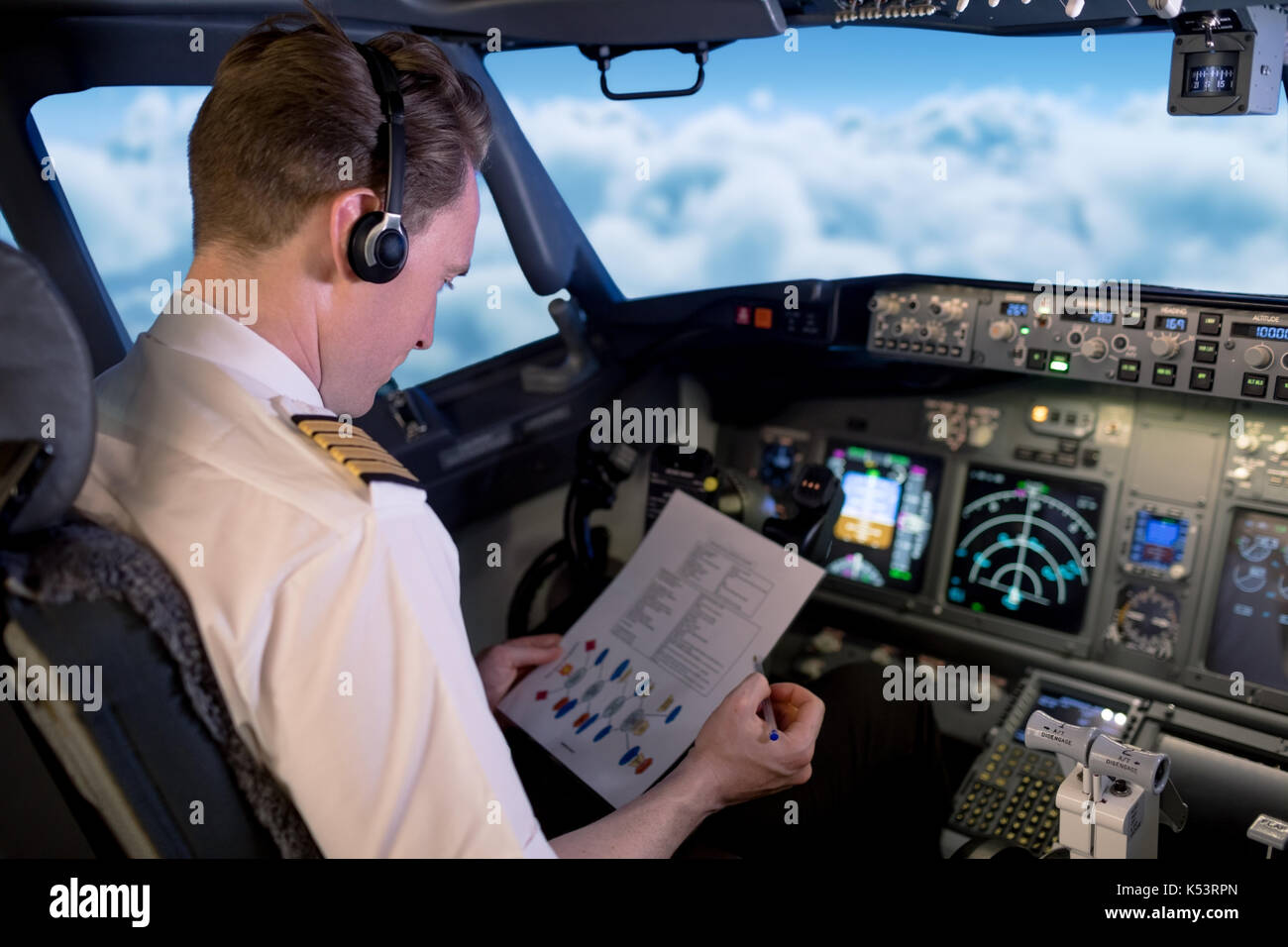 Young pilot sitting in cockpit hi-res stock photography and images - Alamy