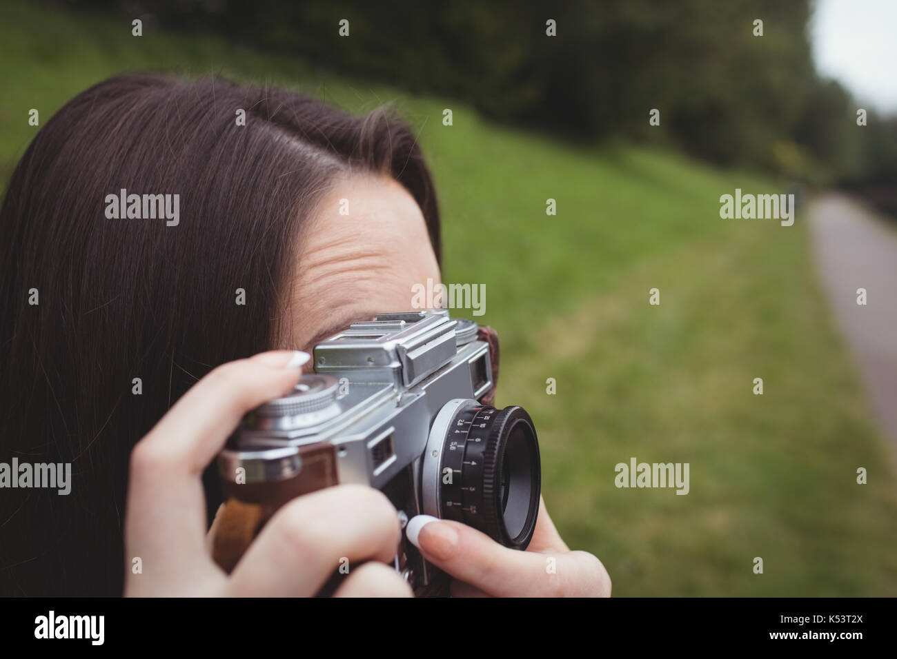 Woman clicking photos nature hi-res stock photography and images - Alamy