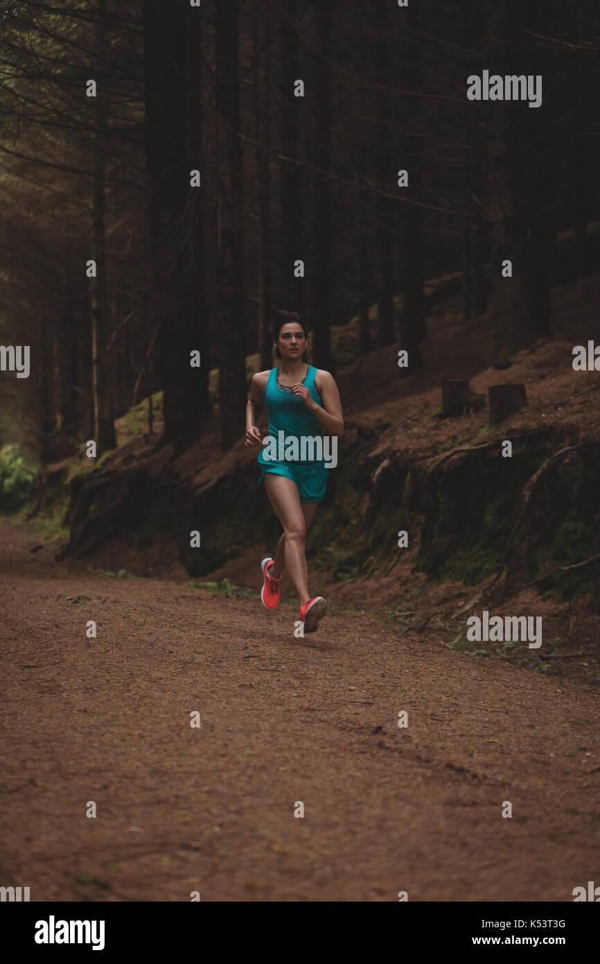 Beautiful woman jogging hi-res stock photography and images - Alamy