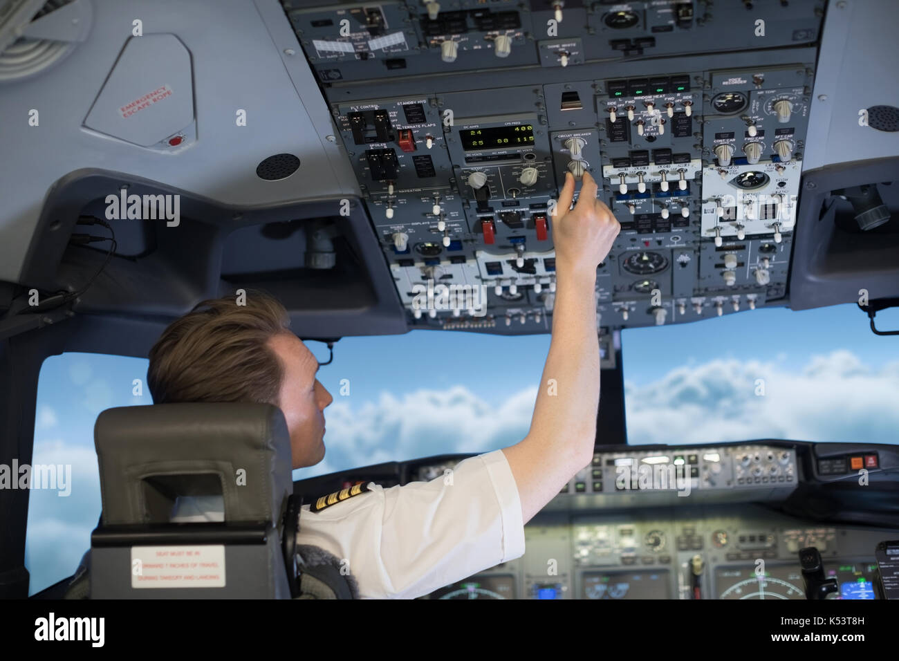 Pilot flying plane rear seat view hi-res stock photography and images ...