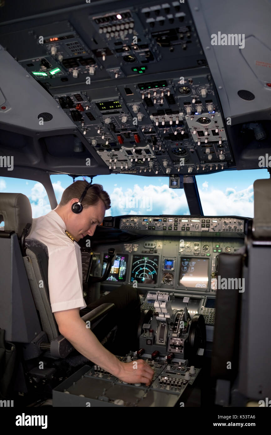 Pilot flying plane rear seat view hi-res stock photography and images ...